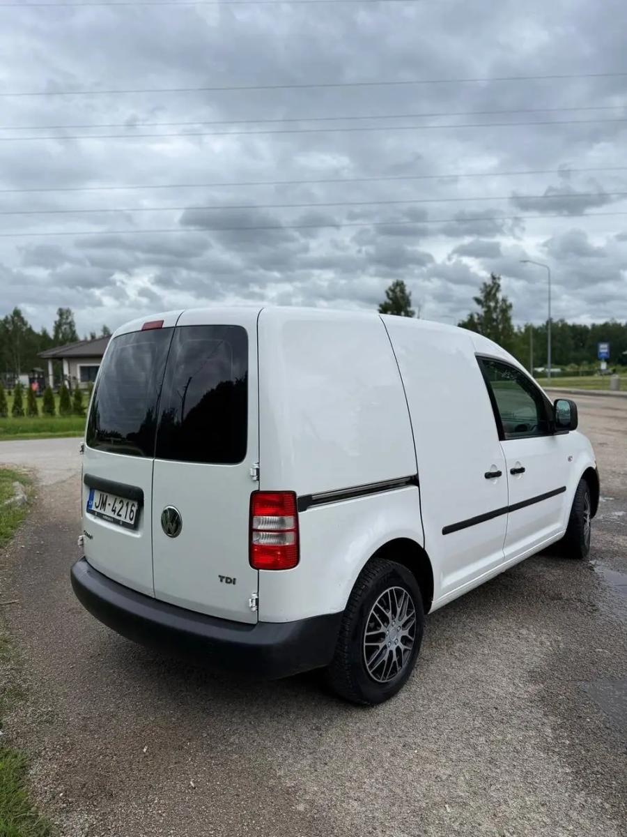 White Volkswagen Caddy 2014 in Riga, with an engine capacity of 1.60 L and mileage of 310 thousand km for 3900 €, photo 7 on AUTOMOTO.COM.LV
