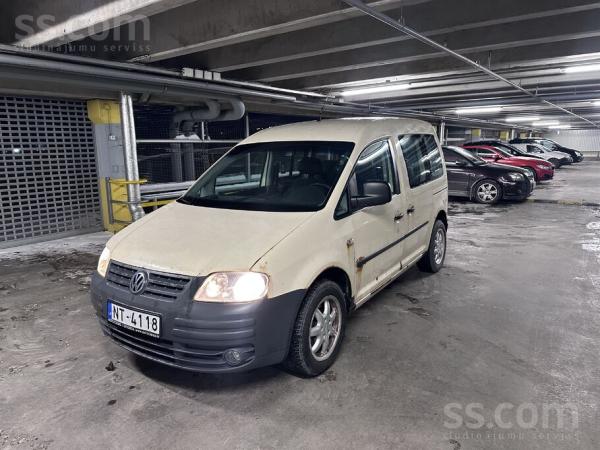 White Volkswagen Caddy 2009 in Riga, with an engine capacity of 1.90 L and mileage of 448 thousand km for 2300 €, photo 1 on AUTOMOTO.COM.LV