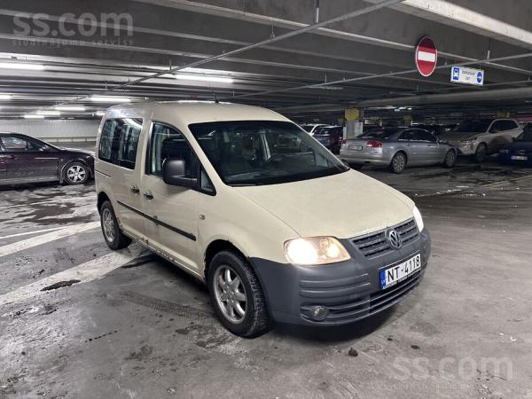 White Volkswagen Caddy 2009 in Riga, with an engine capacity of 1.90 L and mileage of 448 thousand km for 2300 €, photo 2 on AUTOMOTO.COM.LV