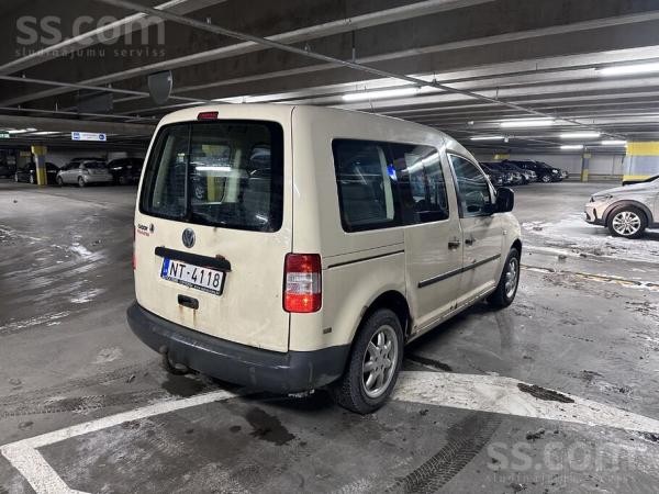 White Volkswagen Caddy 2009 in Riga, with an engine capacity of 1.90 L and mileage of 448 thousand km for 2300 €, photo 3 on AUTOMOTO.COM.LV