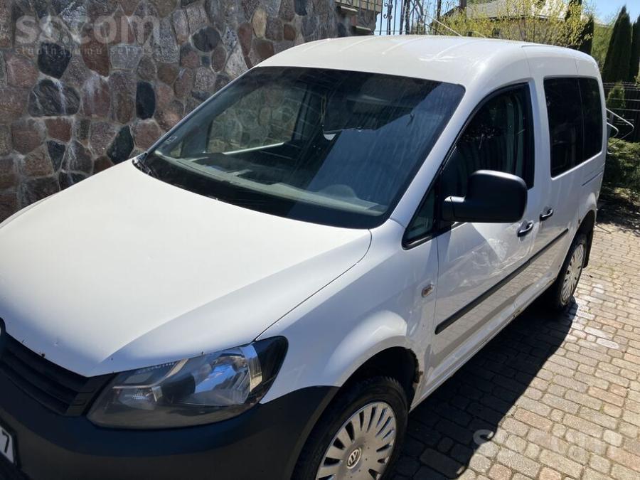 White Volkswagen Caddy 2011 in Riga, with an engine capacity of 2.00 L and mileage of 318 thousand km for 6999 €, photo 3 on AUTOMOTO.COM.LV
