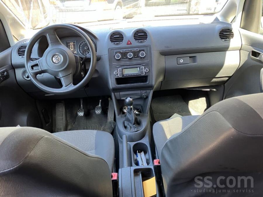 White Volkswagen Caddy 2011 in Riga, with an engine capacity of 2.00 L and mileage of 318 thousand km for 6999 €, photo 4 on AUTOMOTO.COM.LV