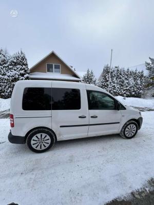 White Volkswagen Caddy 2013 in Vilnius, with an engine capacity of 1.60 L and mileage of 608 thousand km for 2990 €, photo 4 on AUTOMOTO.COM.LV