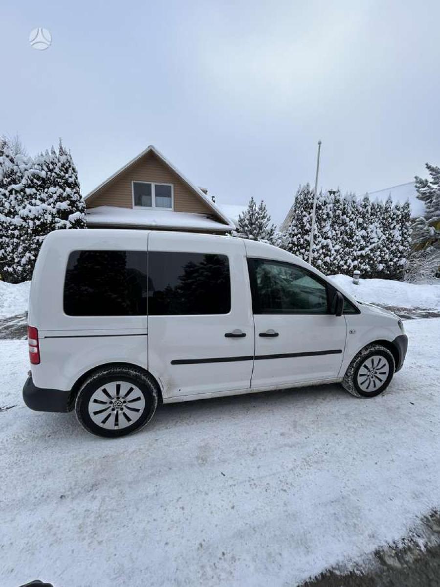 White Volkswagen Caddy 2013 in Vilnius, with an engine capacity of 1.60 L and mileage of 608 thousand km for 2990 €, photo 4 on AUTOMOTO.COM.LV
