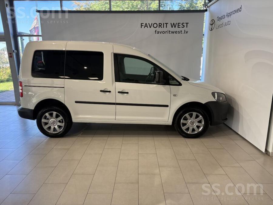 White Volkswagen Caddy 2014 in Ventspils, with an engine capacity of 2.00 L and mileage of 212 thousand km for 7490 €, photo 4 on AUTOMOTO.COM.LV
