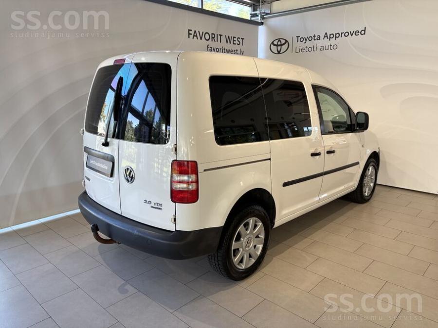 White Volkswagen Caddy 2014 in Ventspils, with an engine capacity of 2.00 L and mileage of 212 thousand km for 7490 €, photo 5 on AUTOMOTO.COM.LV