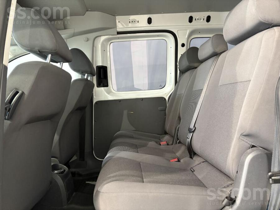White Volkswagen Caddy 2014 in Ventspils, with an engine capacity of 2.00 L and mileage of 212 thousand km for 7490 €, photo 7 on AUTOMOTO.COM.LV
