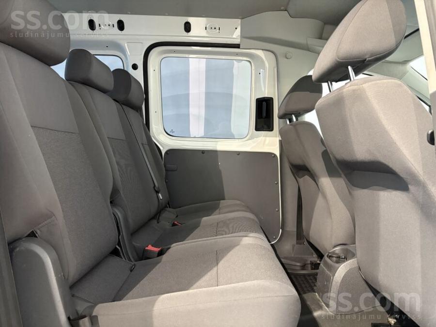 White Volkswagen Caddy 2014 in Ventspils, with an engine capacity of 2.00 L and mileage of 212 thousand km for 7490 €, photo 9 on AUTOMOTO.COM.LV