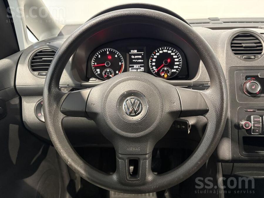 White Volkswagen Caddy 2014 in Ventspils, with an engine capacity of 2.00 L and mileage of 212 thousand km for 7490 €, photo 12 on AUTOMOTO.COM.LV
