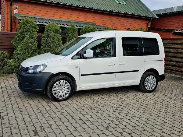 White Volkswagen Caddy 2015 in Kretinga, with an engine capacity of 1.60 L and mileage of 289 thousand km for 6999 €, photo 6 on AUTOMOTO.COM.LV