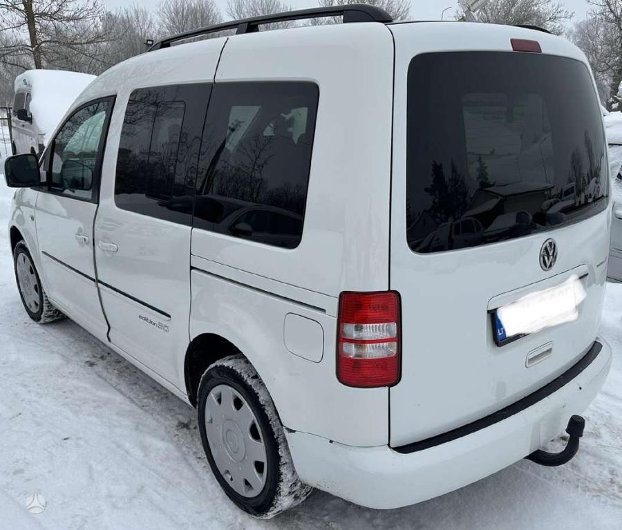 White Volkswagen Caddy 2015 in Kelme, with an engine capacity of 1.97 L and mileage of 270 thousand km for 6499 €, photo 4 on AUTOMOTO.COM.LV