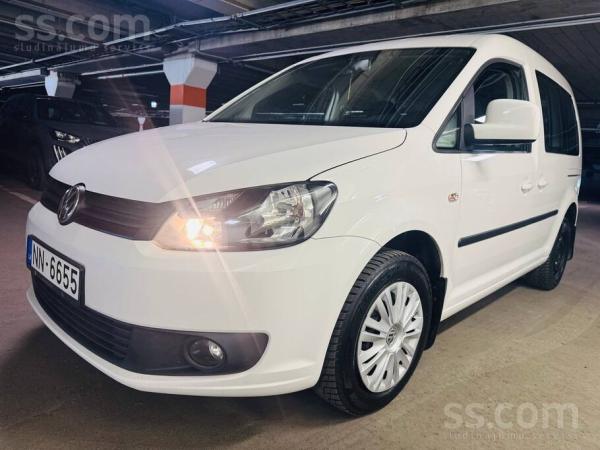 White Volkswagen Caddy 2015 in Riga, with an engine capacity of 1.20 L and mileage of 122 thousand km for 7770 €, photo 5 on AUTOMOTO.COM.LV