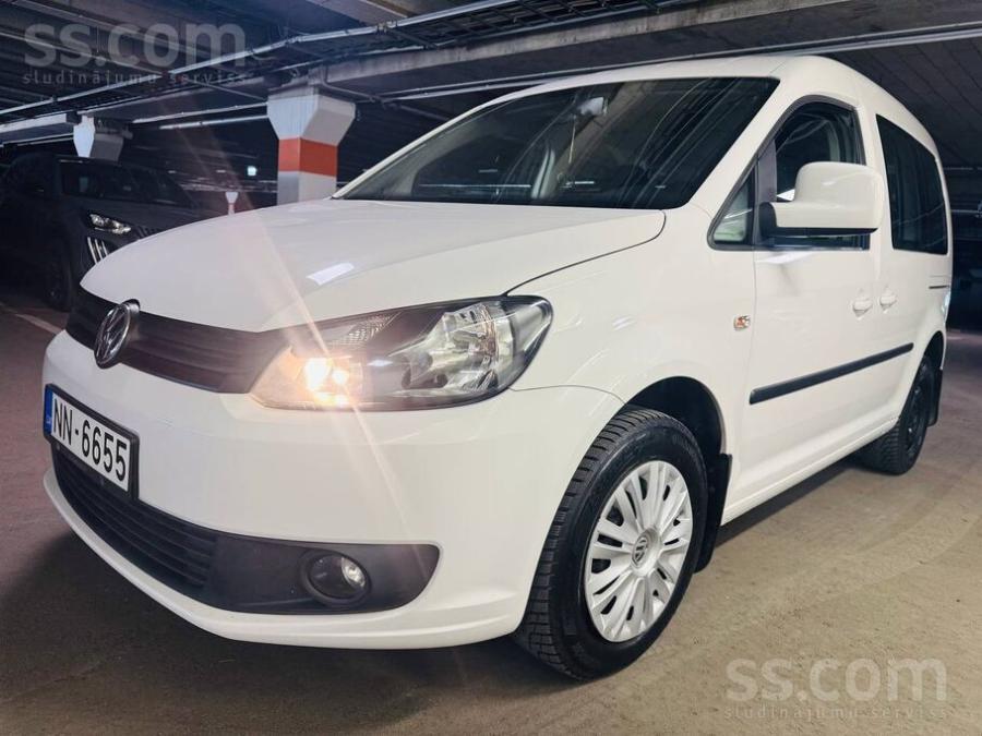 White Volkswagen Caddy 2015 in Riga, with an engine capacity of 1.20 L and mileage of 122 thousand km for 7770 €, photo 6 on AUTOMOTO.COM.LV