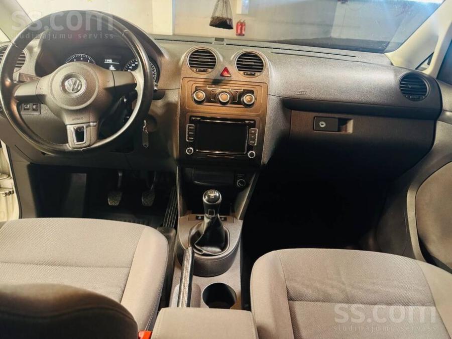 White Volkswagen Caddy 2015 in Riga, with an engine capacity of 1.20 L and mileage of 122 thousand km for 7770 €, photo 9 on AUTOMOTO.COM.LV