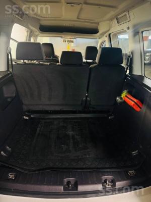 White Volkswagen Caddy 2015 in Riga, with an engine capacity of 1.20 L and mileage of 122 thousand km for 7770 €, photo 10 on AUTOMOTO.COM.LV