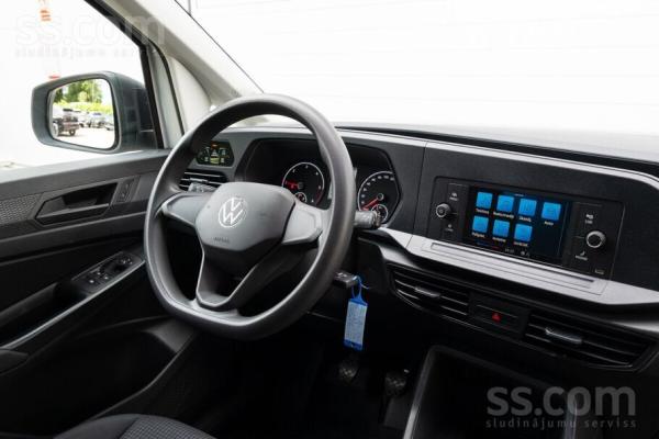 White Volkswagen Caddy 2021 in Riga, with an engine capacity of 2.00 L and mileage of 110 thousand km for 12950 €, photo 7 on AUTOMOTO.COM.LV