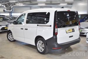 White Volkswagen Caddy 2021 in Riga, with an engine capacity of 2.00 L and mileage of 150 thousand km for 14500 €, photo 3 on AUTOMOTO.COM.LV