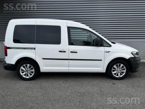 White Volkswagen Caddy 2015 in Riga, with an engine capacity of 1.60 L and mileage of 184 thousand km for 6900 €, photo 7 on AUTOMOTO.COM.LV