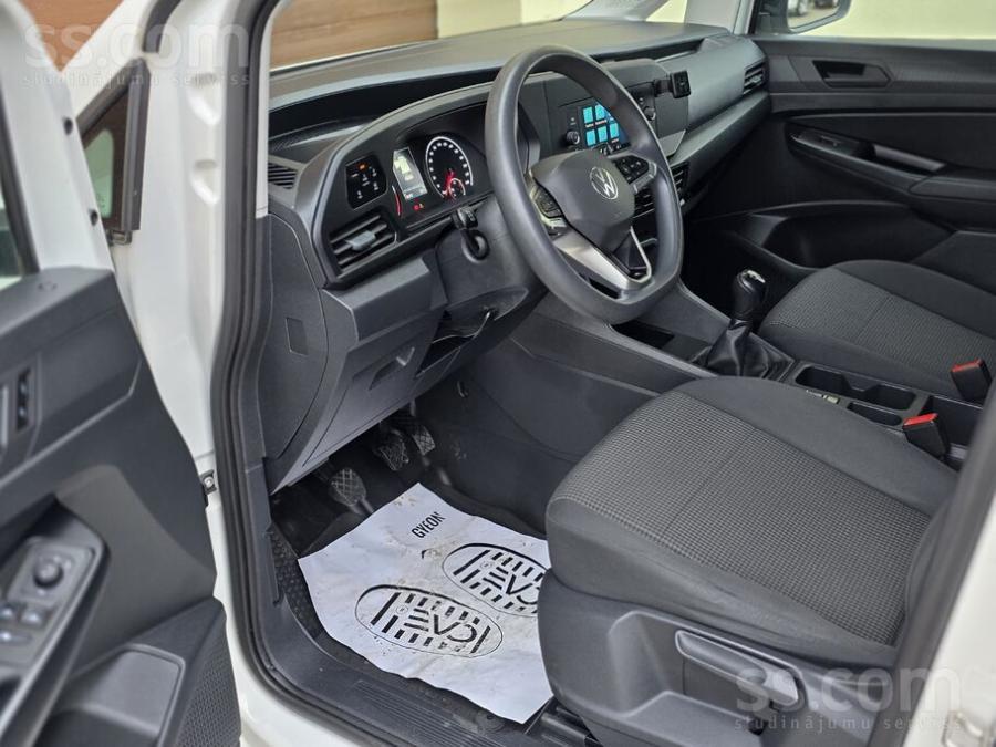 White Volkswagen Caddy 2021 in Riga, with an engine capacity of 2.00 L and mileage of 138 thousand km for 14495 €, photo 12 on AUTOMOTO.COM.LV