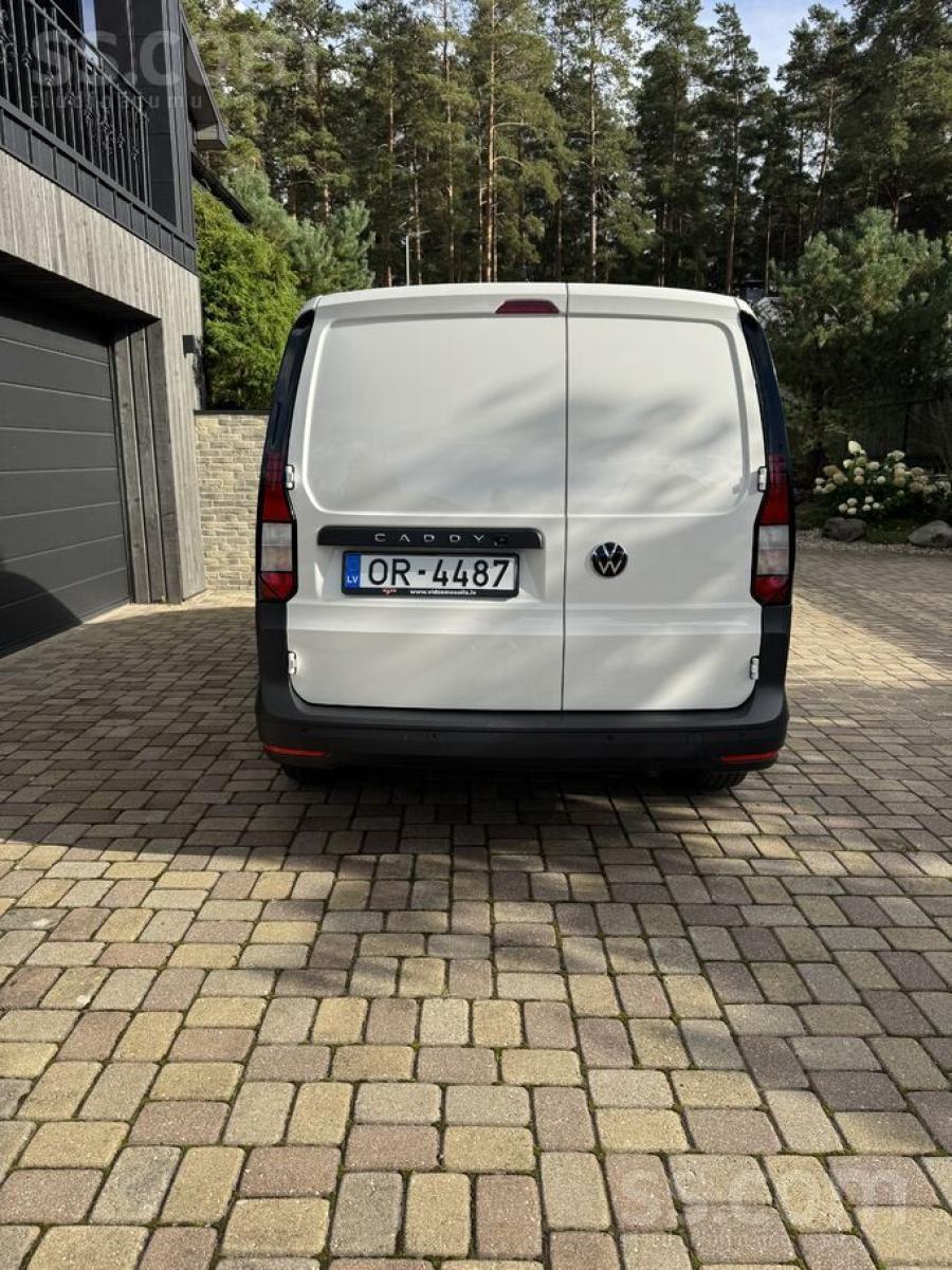 White Volkswagen Caddy 2023 in Riga, with an engine capacity of 2.00 L and mileage of 132 thousand km for 18200 €, photo 4 on AUTOMOTO.COM.LV