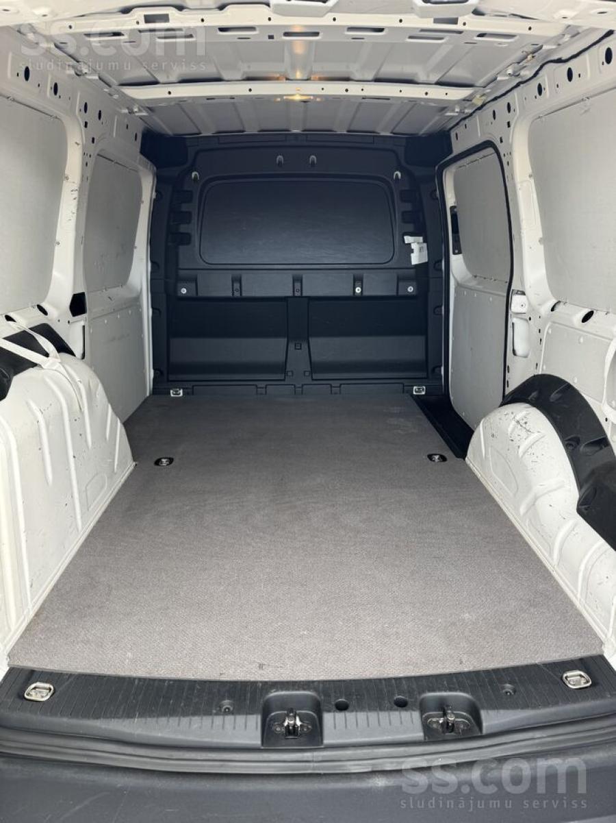 White Volkswagen Caddy 2023 in Riga, with an engine capacity of 2.00 L and mileage of 132 thousand km for 18200 €, photo 5 on AUTOMOTO.COM.LV
