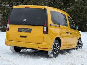 Yellow Volkswagen Caddy 2021 in Tukums, with an engine capacity of 2.00 L and mileage of 198 thousand km for 17990 €, photo 6 on AUTOMOTO.COM.LV
