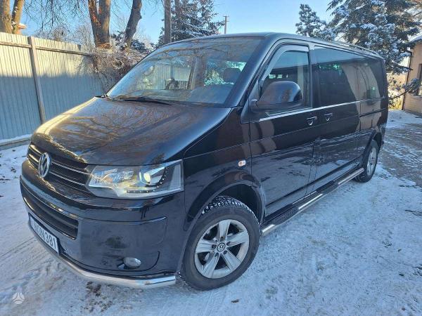 Black Volkswagen Caravelle 2012 in Marijampole, with an engine capacity of 1.97 L and mileage of 249 thousand km for 13800 €, photo 1 on AUTOMOTO.COM.LV