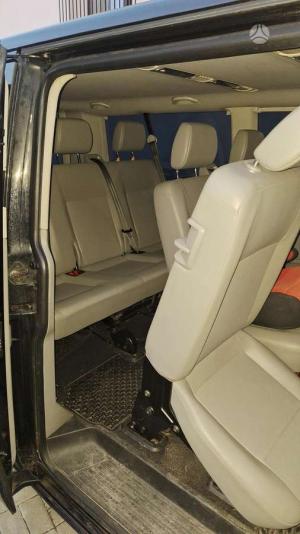 Black Volkswagen Caravelle 2013 in Kaunas, with an engine capacity of 1.97 L and mileage of 317 thousand km for 12500 €, photo 11 on AUTOMOTO.COM.LV
