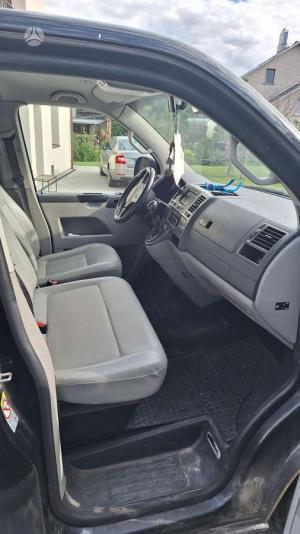 Black Volkswagen Caravelle 2013 in Kaunas, with an engine capacity of 1.97 L and mileage of 317 thousand km for 12500 €, photo 13 on AUTOMOTO.COM.LV