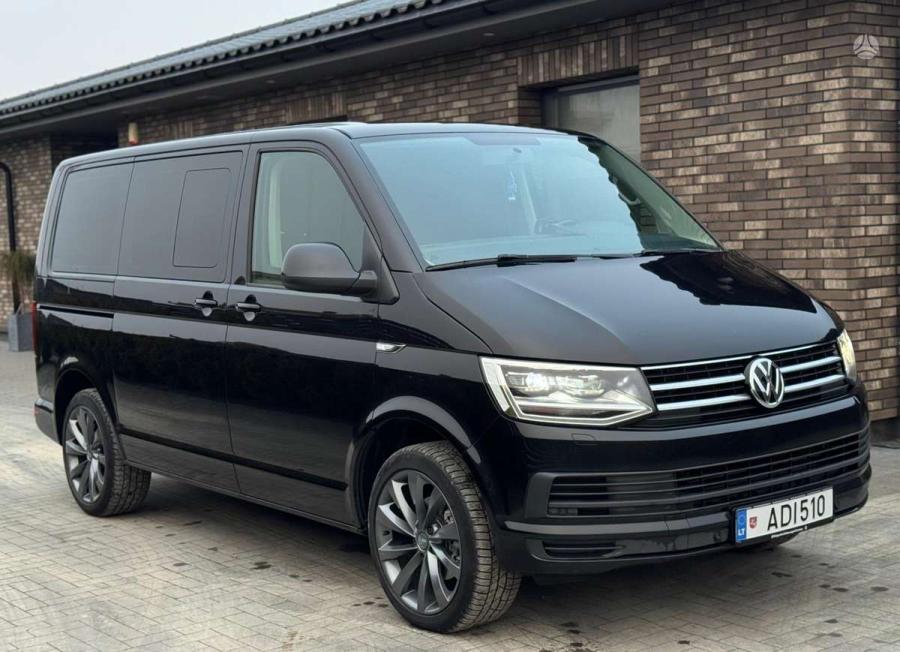 Black Volkswagen Caravelle 2016 in Klaipeda, with an engine capacity of 2.00 L and mileage of 290 thousand km for 17999 €, photo 1 on AUTOMOTO.COM.LV