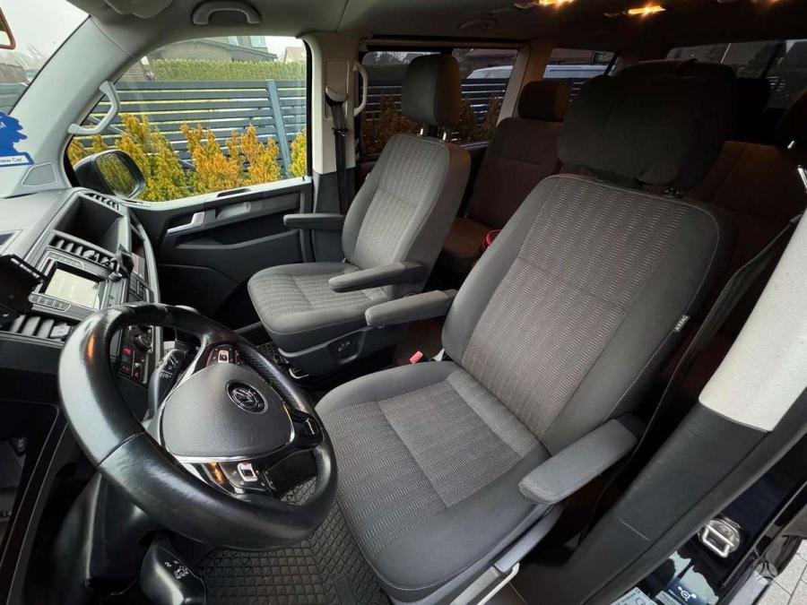 Black Volkswagen Caravelle 2016 in Klaipeda, with an engine capacity of 2.00 L and mileage of 290 thousand km for 17999 €, photo 3 on AUTOMOTO.COM.LV
