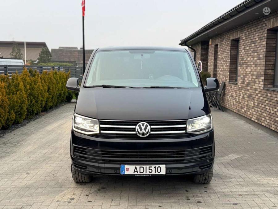 Black Volkswagen Caravelle 2016 in Klaipeda, with an engine capacity of 2.00 L and mileage of 290 thousand km for 17999 €, photo 4 on AUTOMOTO.COM.LV