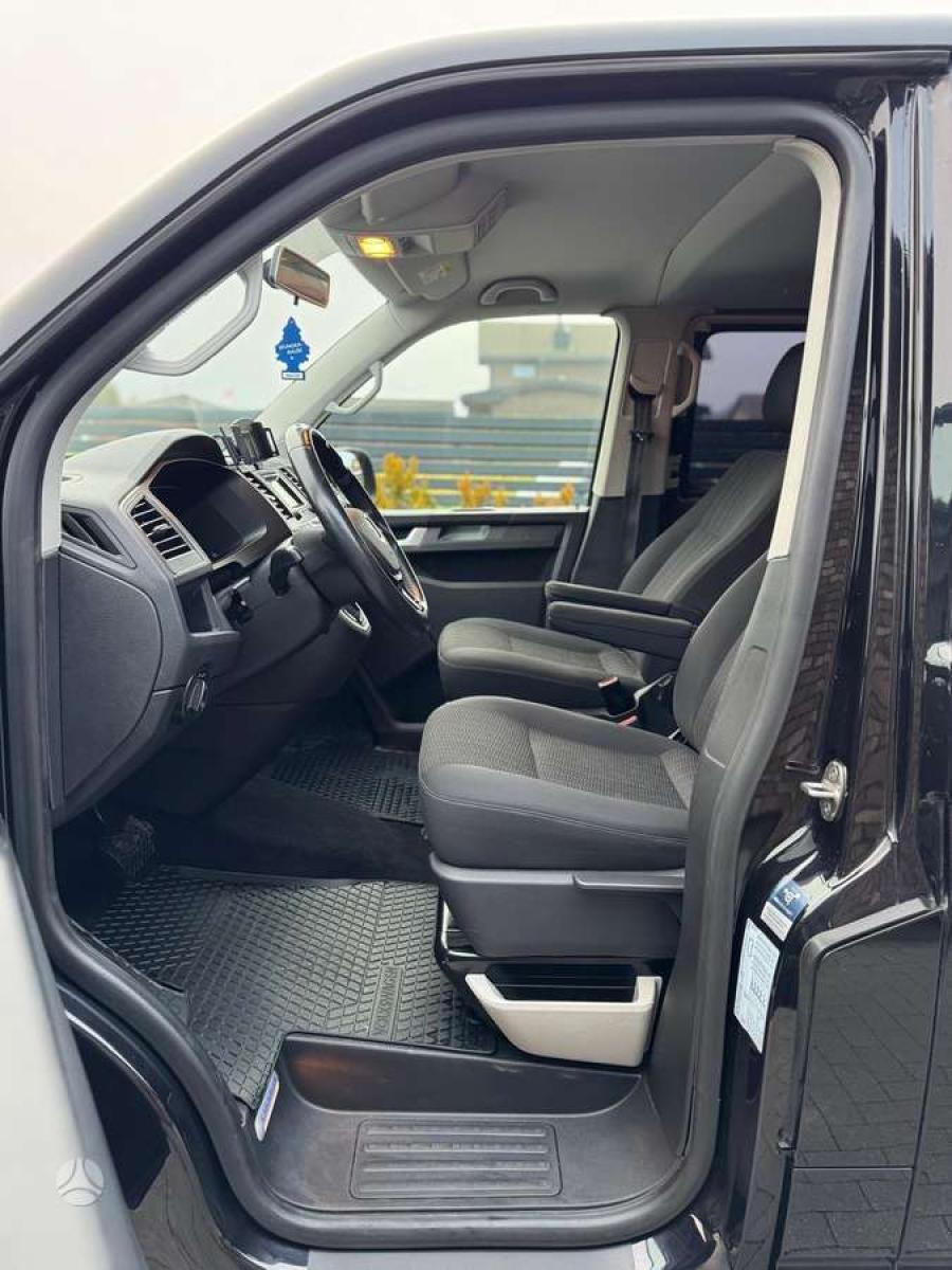 Black Volkswagen Caravelle 2016 in Klaipeda, with an engine capacity of 2.00 L and mileage of 290 thousand km for 17999 €, photo 11 on AUTOMOTO.COM.LV