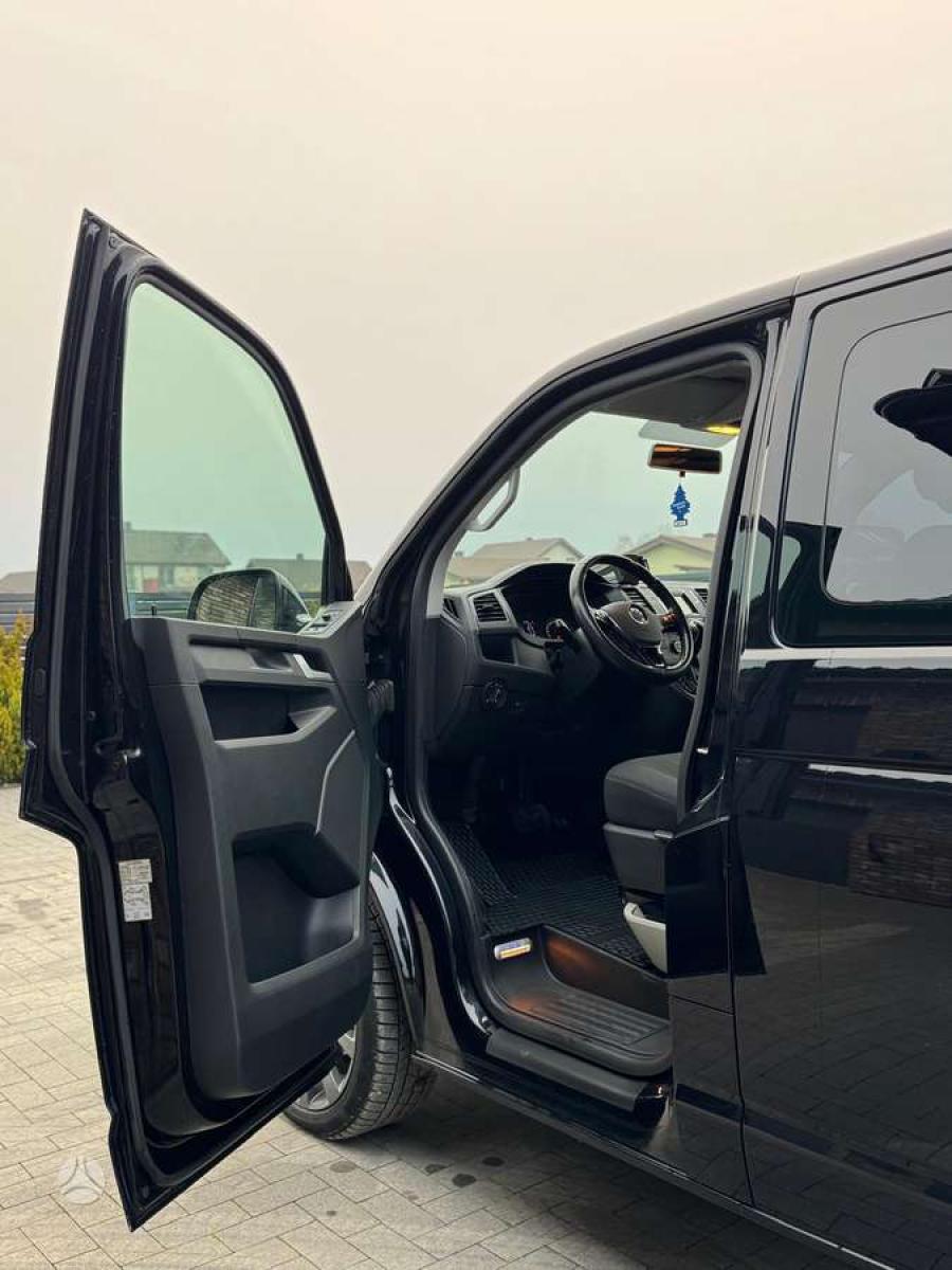 Black Volkswagen Caravelle 2016 in Klaipeda, with an engine capacity of 2.00 L and mileage of 290 thousand km for 17999 €, photo 12 on AUTOMOTO.COM.LV