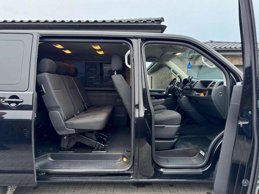 Black Volkswagen Caravelle 2016 in Klaipeda, with an engine capacity of 2.00 L and mileage of 290 thousand km for 17999 €, photo 13 on AUTOMOTO.COM.LV