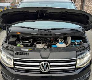 Black Volkswagen Caravelle 2016 in Klaipeda, with an engine capacity of 2.00 L and mileage of 290 thousand km for 17999 €, photo 22 on AUTOMOTO.COM.LV