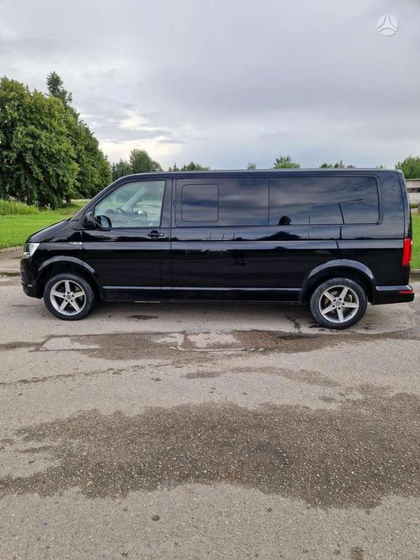 Black Volkswagen Caravelle 2016 in Sakiai, with an engine capacity of 2.00 L and mileage of 288 thousand km for 16999 €, photo 6 on AUTOMOTO.COM.LV