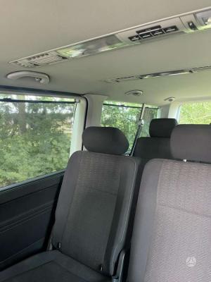 Black Volkswagen Caravelle 2018 in Kaunas, with an engine capacity of 2.00 L and mileage of 326 thousand km for 14950 €, photo 21 on AUTOMOTO.COM.LV