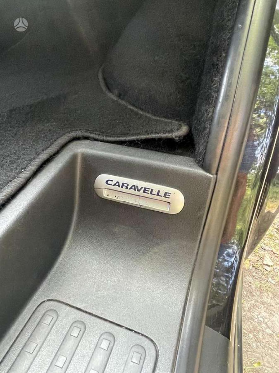 Black Volkswagen Caravelle 2018 in Kaunas, with an engine capacity of 1.97 L and mileage of 326 thousand km for 14900 €, photo 15 on AUTOMOTO.COM.LV