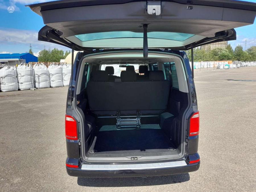 Black Volkswagen Caravelle 2018 in Kaunas, with an engine capacity of 2.00 L and mileage of 328 thousand km for 18800 €, photo 16 on AUTOMOTO.COM.LV