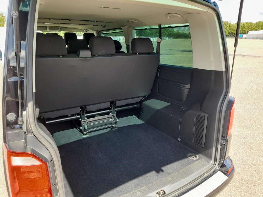 Black Volkswagen Caravelle 2018 in Kaunas, with an engine capacity of 2.00 L and mileage of 328 thousand km for 18800 €, photo 17 on AUTOMOTO.COM.LV