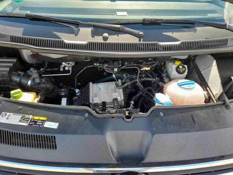 Black Volkswagen Caravelle 2018 in Kaunas, with an engine capacity of 2.00 L and mileage of 328 thousand km for 18800 €, photo 29 on AUTOMOTO.COM.LV