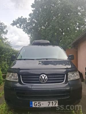 Black Volkswagen Caravelle 2006 in Riga, with an engine capacity of 2.50 L and mileage of 450 thousand km for 4000 €, photo 1 on AUTOMOTO.COM.LV