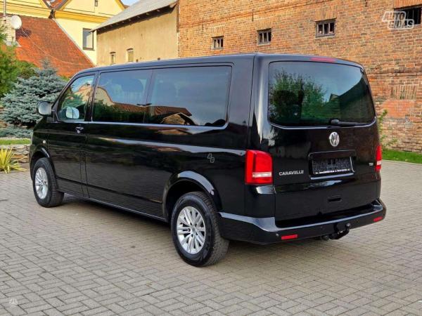 Melns Volkswagen Caravelle 2011 Viļņa, ar dzinēja tilpumu 2.00 L un nobraukumu 271 tūkst. km par 11400 €, foto 6 vietnē AUTOMOTO.COM.LV