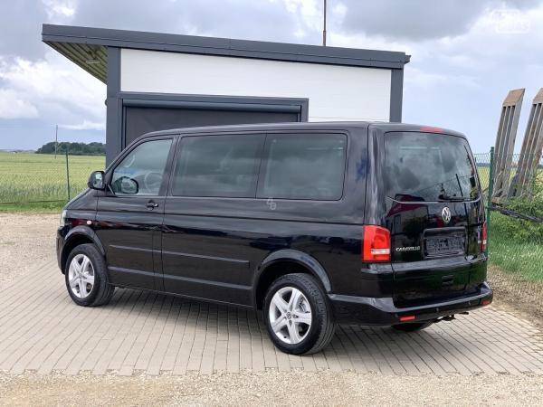 Black Volkswagen Caravelle 2011 in Kaunas, with an engine capacity of 2.00 L and mileage of 240 thousand km for 13499 €, photo 4 on AUTOMOTO.COM.LV
