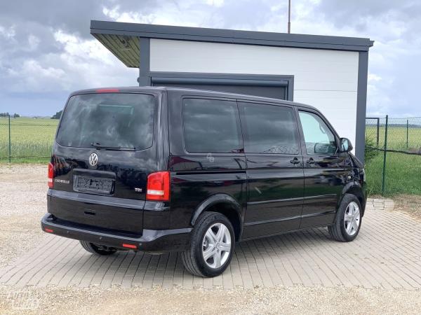 Black Volkswagen Caravelle 2011 in Kaunas, with an engine capacity of 2.00 L and mileage of 240 thousand km for 13499 €, photo 5 on AUTOMOTO.COM.LV