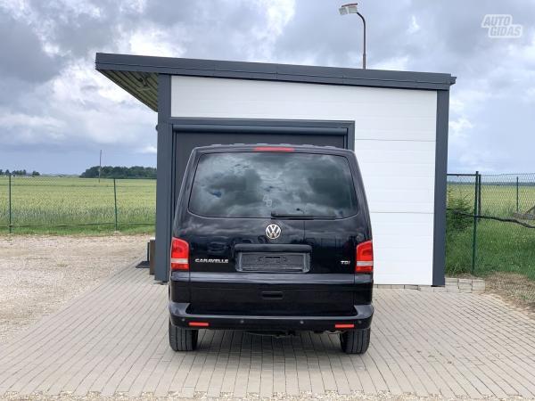 Black Volkswagen Caravelle 2011 in Kaunas, with an engine capacity of 2.00 L and mileage of 240 thousand km for 13499 €, photo 7 on AUTOMOTO.COM.LV