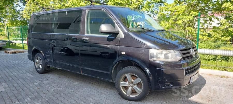 Black Volkswagen Caravelle 2011 in Riga, with an engine capacity of 2.00 L and mileage of 314 thousand km for 5700 €, photo 3 on AUTOMOTO.COM.LV
