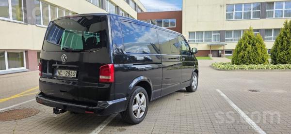 Black Volkswagen Caravelle 2012 in Riga, with an engine capacity of 2.00 L and mileage of 40 thousand km for 8950 €, photo 2 on AUTOMOTO.COM.LV