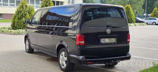 Black Volkswagen Caravelle 2012 in Riga, with an engine capacity of 2.00 L and mileage of 40 thousand km for 8950 €, photo 3 on AUTOMOTO.COM.LV